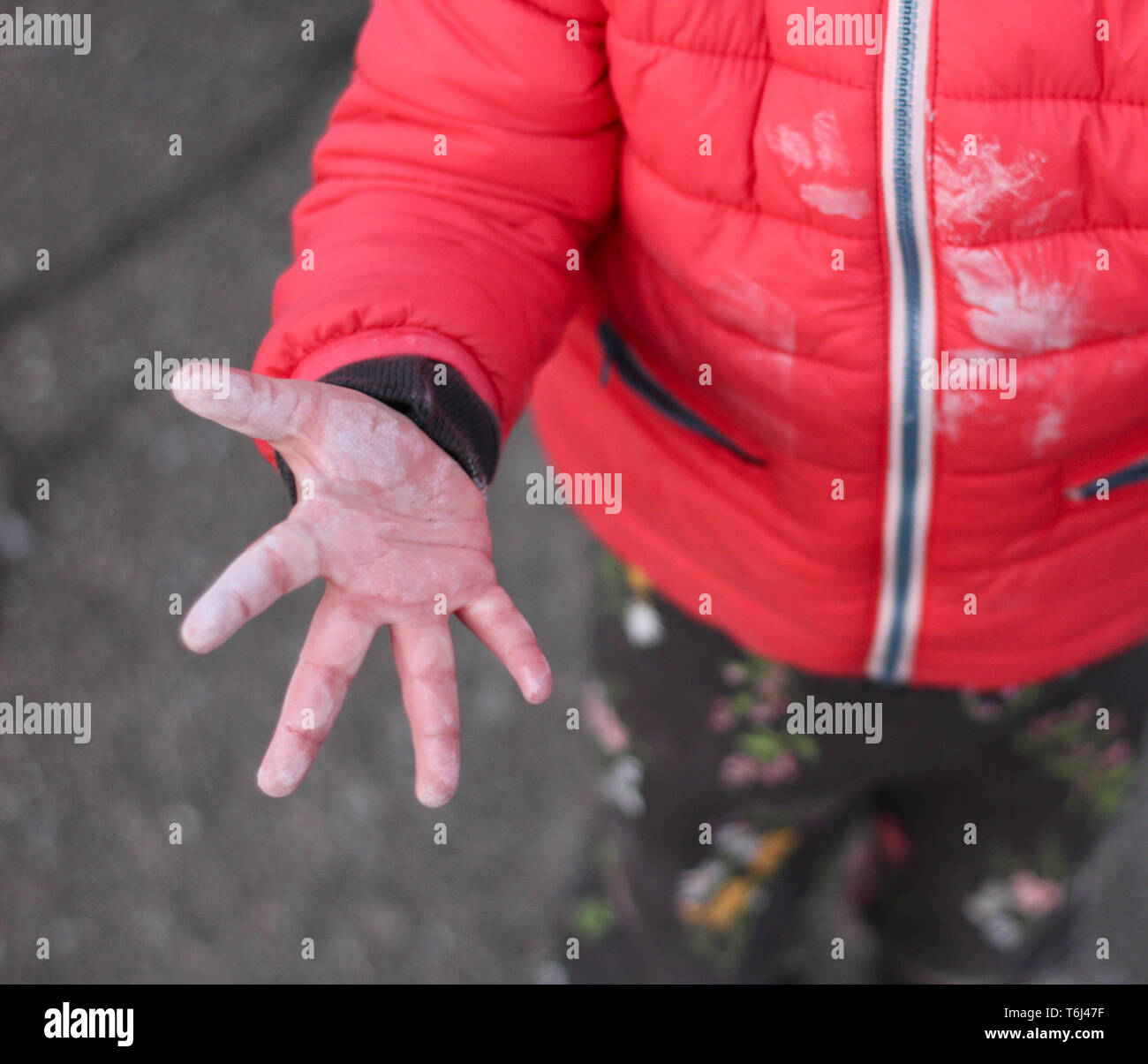 small children's dirty hands arms outstretched to the top on the ...