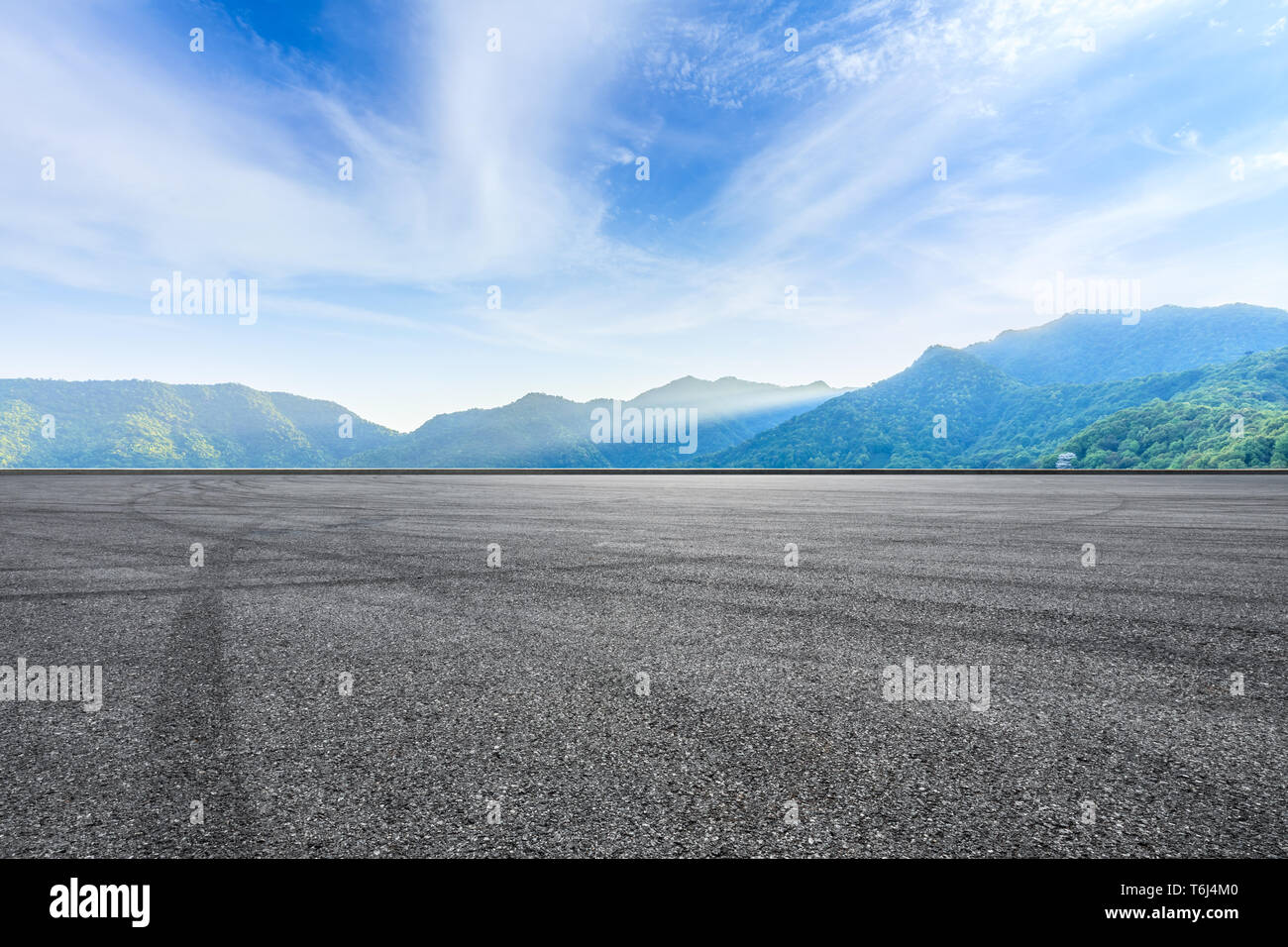 Empty asphalt race track and beautiful natural landscape Stock Photo ...