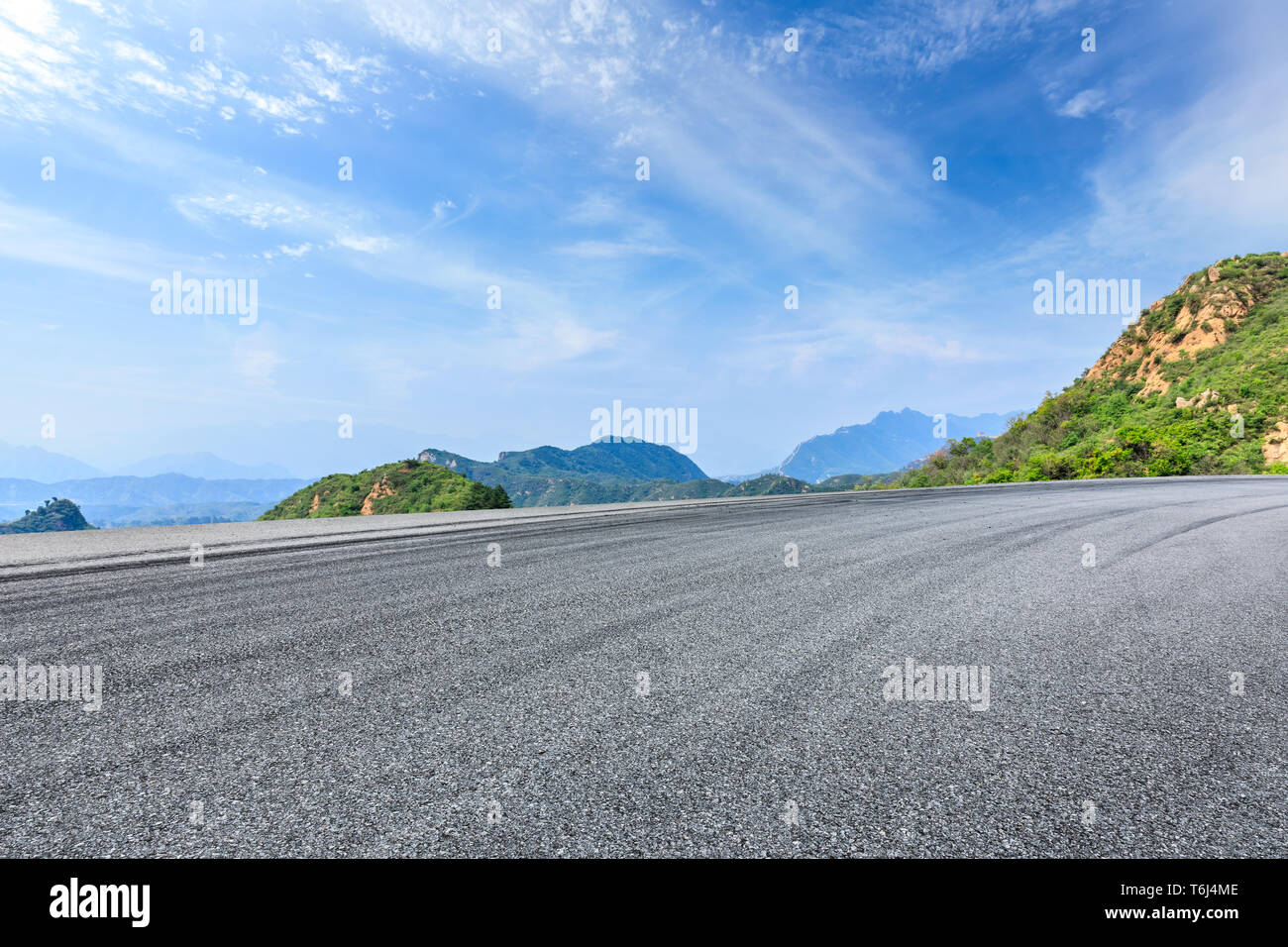 Empty asphalt race track and beautiful natural landscape Stock Photo ...