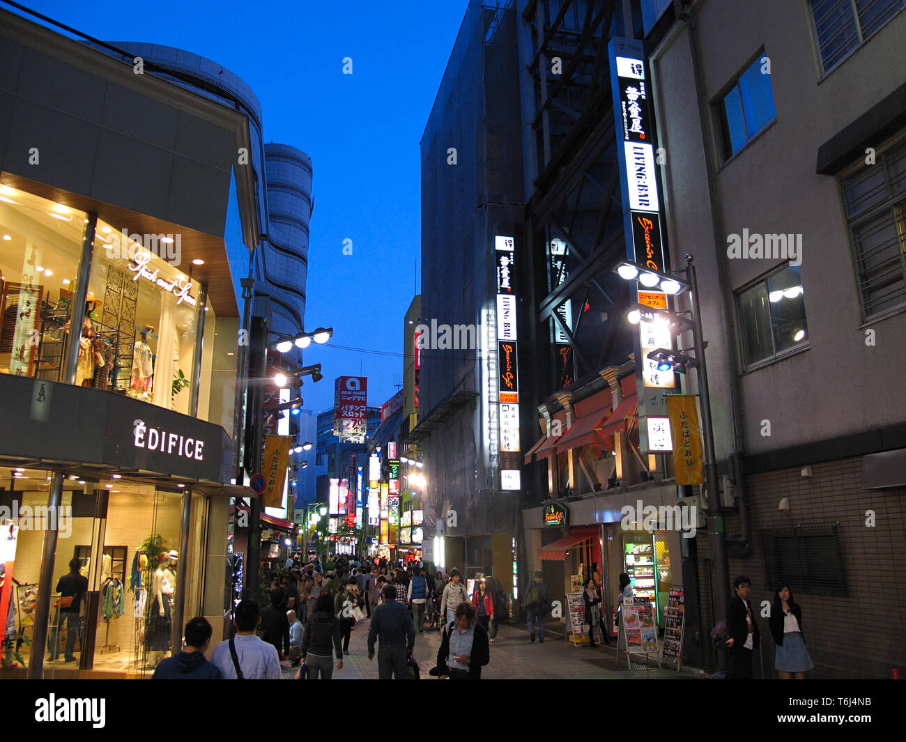 Street scene in Shinjuku district, Tokyo, Japan Stock Photo - Alamy