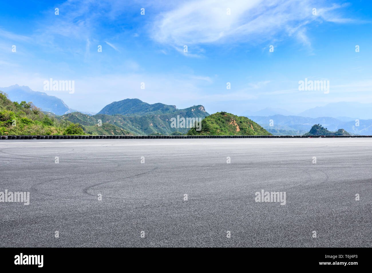 Empty asphalt race track and beautiful natural landscape Stock Photo ...