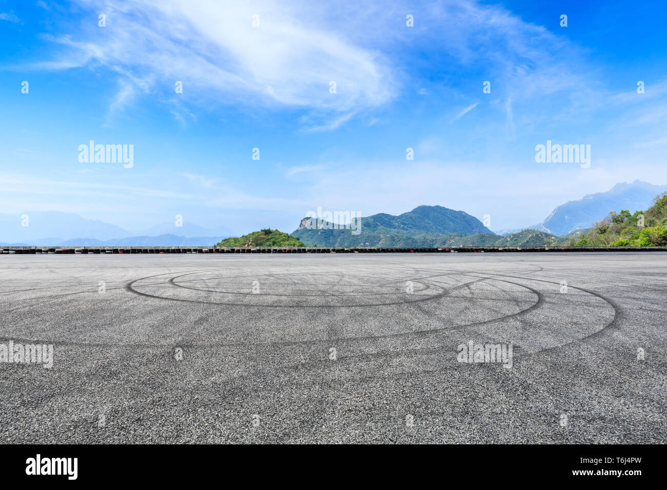 Empty asphalt race track and beautiful natural landscape Stock Photo ...