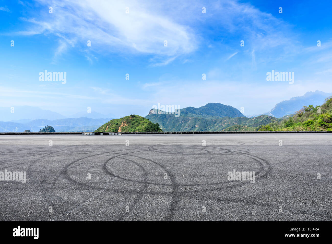 Empty asphalt race track and beautiful natural landscape Stock Photo ...