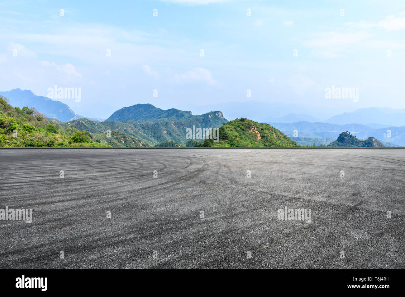 Empty asphalt race track and beautiful natural landscape Stock Photo ...