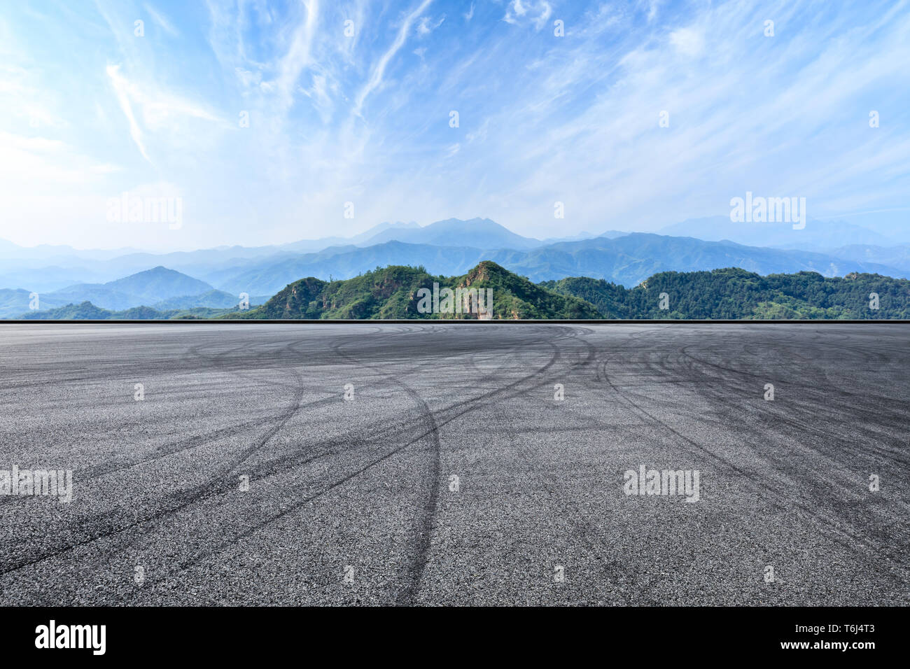 Empty asphalt race track and beautiful natural landscape Stock Photo ...