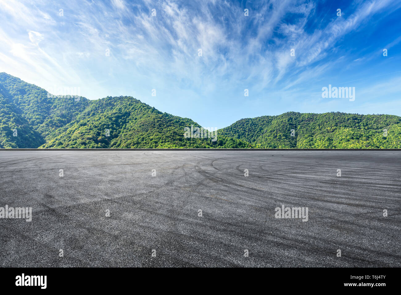 Empty asphalt race track and beautiful natural landscape Stock Photo ...