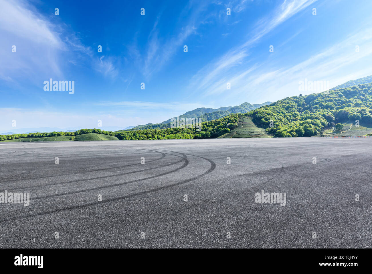 Empty asphalt race track and beautiful natural landscape Stock Photo ...