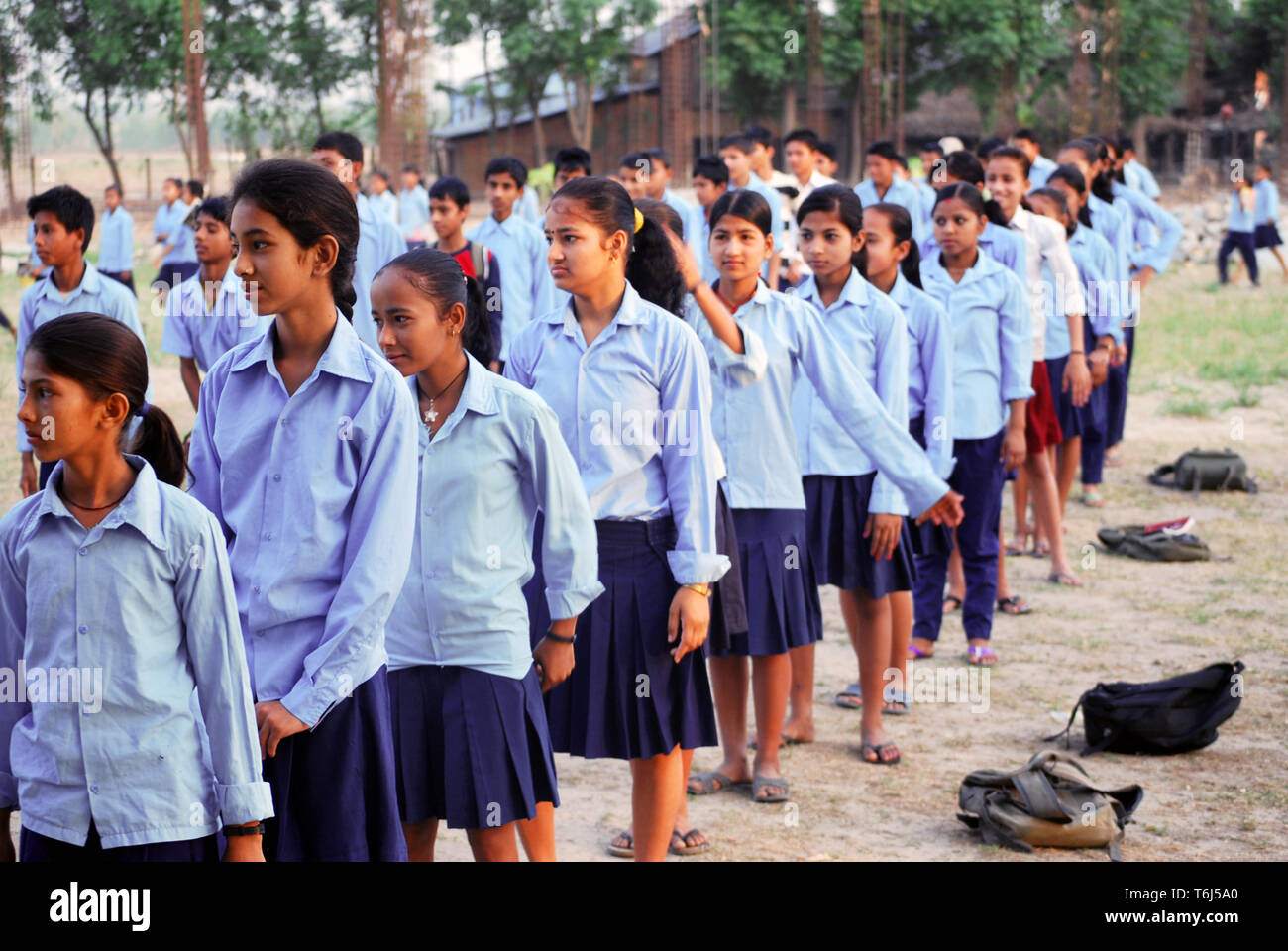 Students waiting to enter the school, Nepal Stock Photo - Alamy