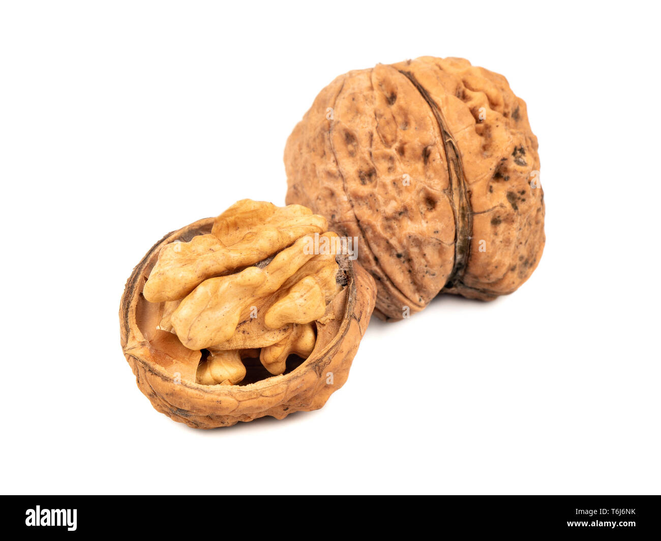 Dry walnut with half isolated on white background Stock Photo - Alamy