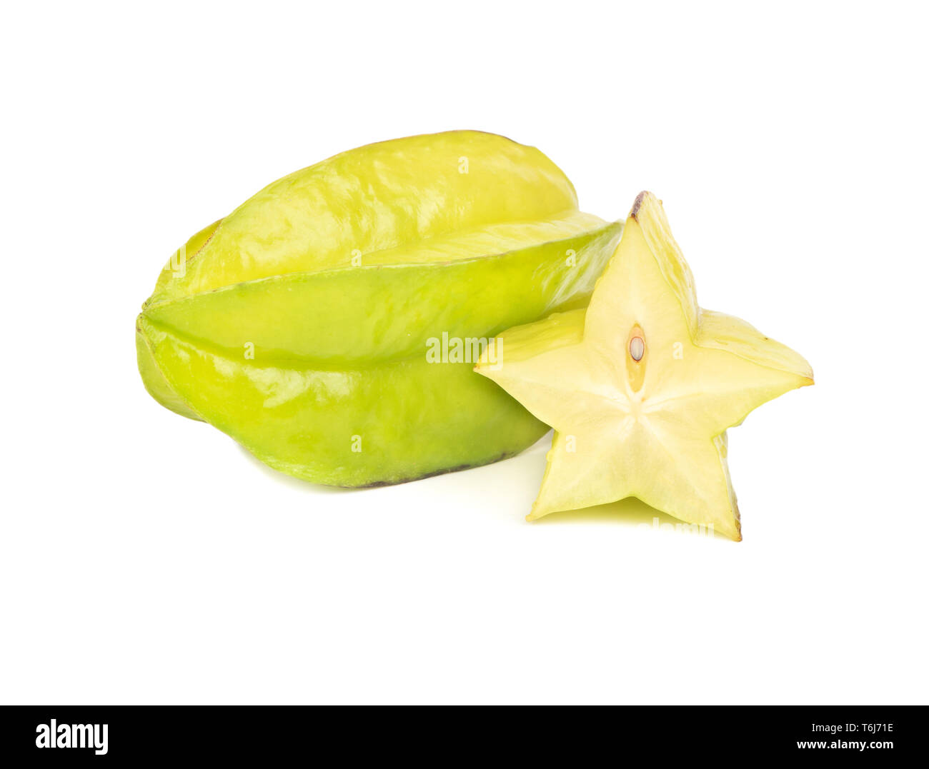 Fresh carambola fruit with juicy half on white background Stock Photo ...