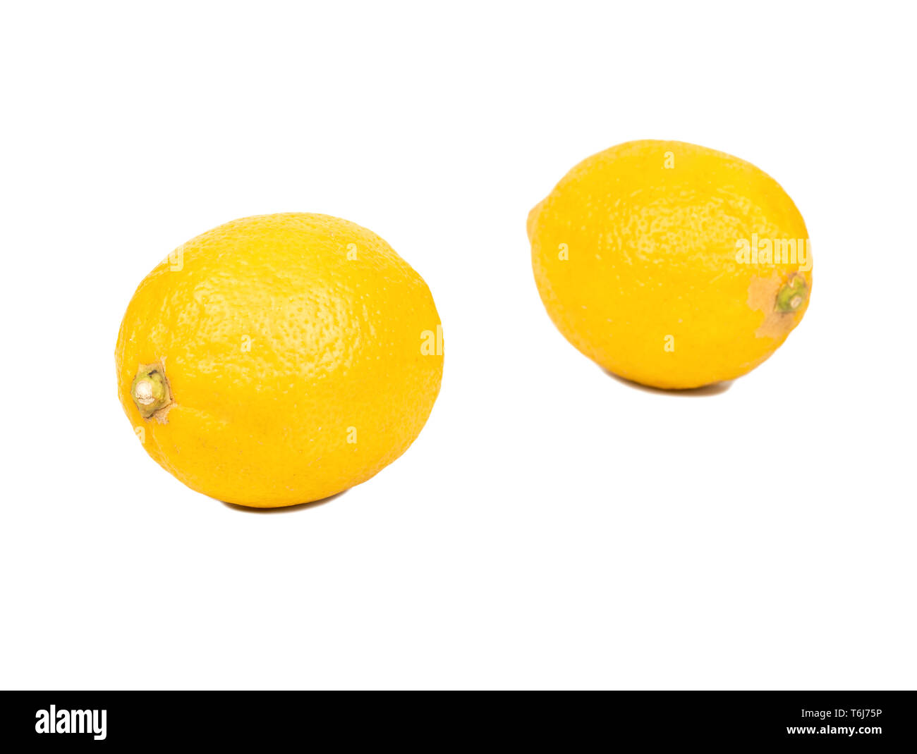 Two fresh lemon fruits isolated on white background Stock Photo - Alamy
