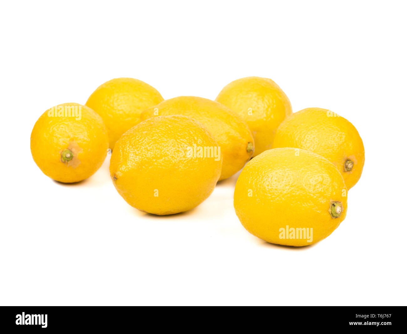 Scattered fresh fruit lemons on white background Stock Photo - Alamy