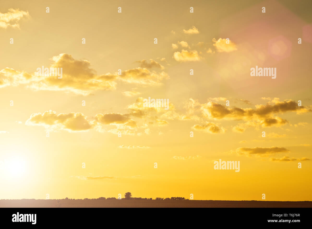 Sunset sky in summer (with flares ver Stock Photo - Alamy