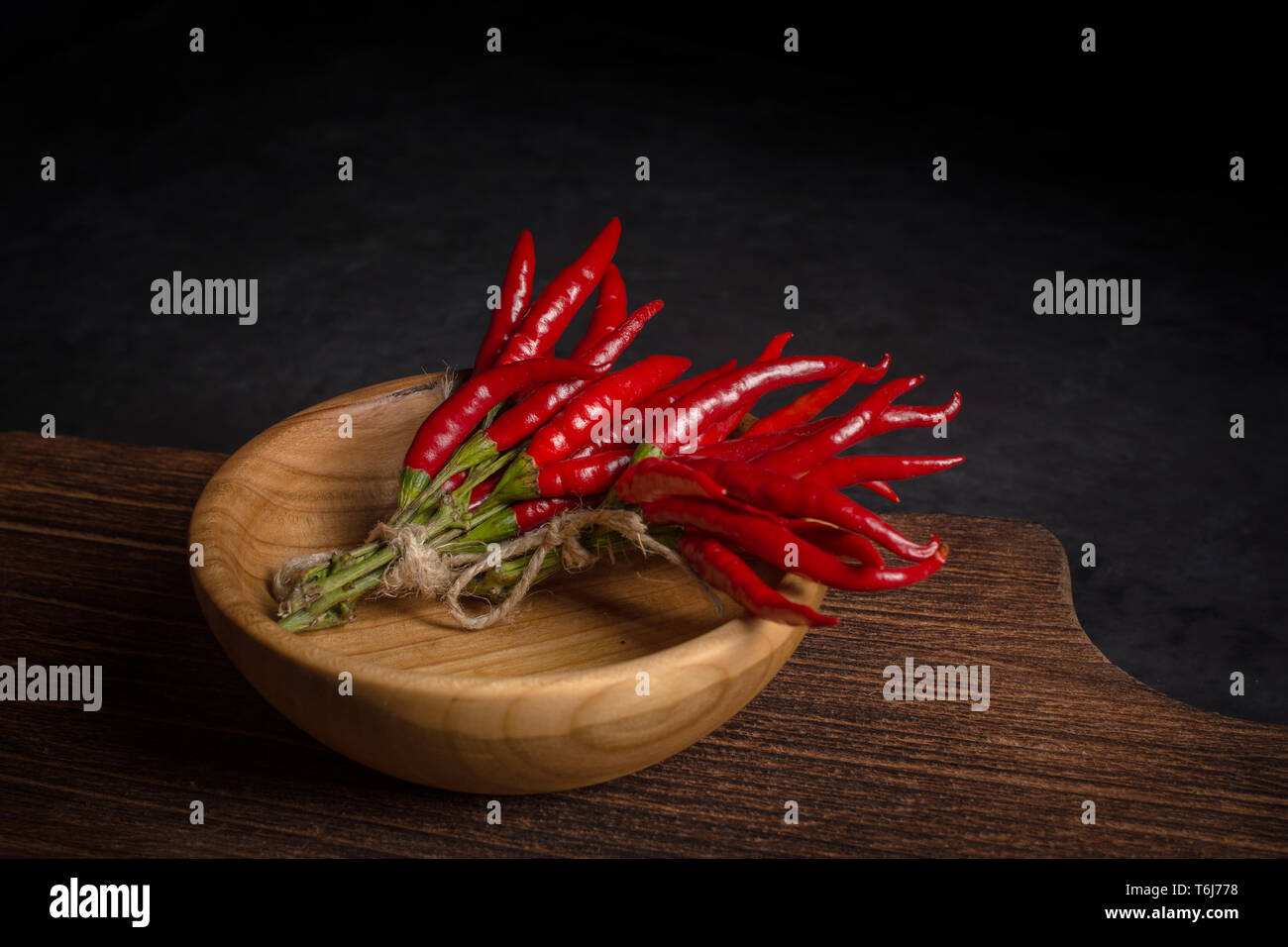 bunch fresh raw red hot chilli pepper Stock Photo - Alamy