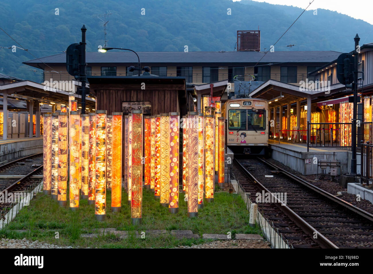 Train station in Arashiyama district in Kyoto, illuminated with modern ...