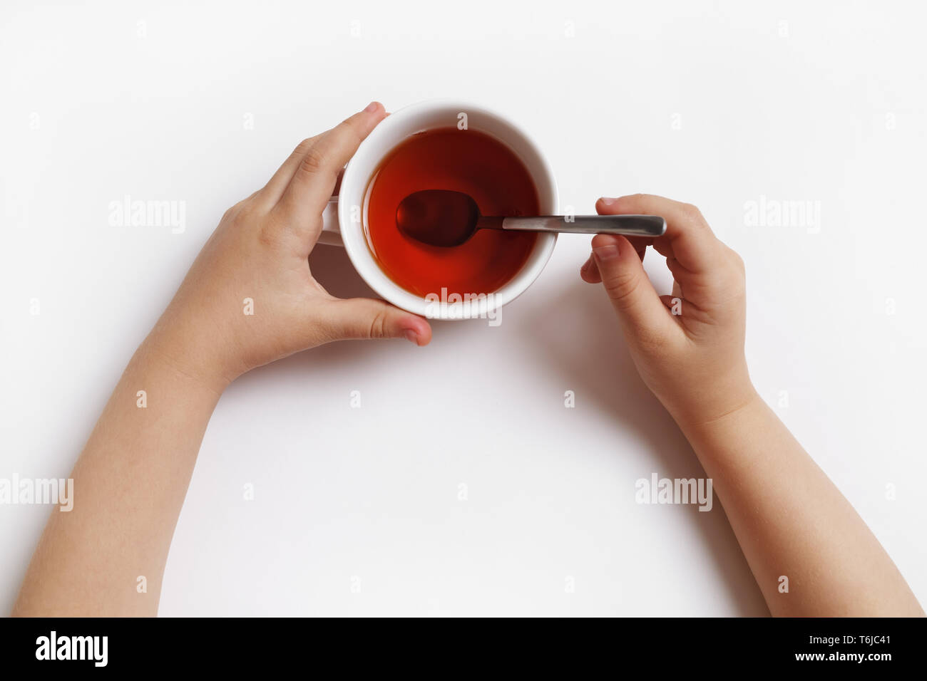 Child tea cup hi-res stock photography and images - Alamy