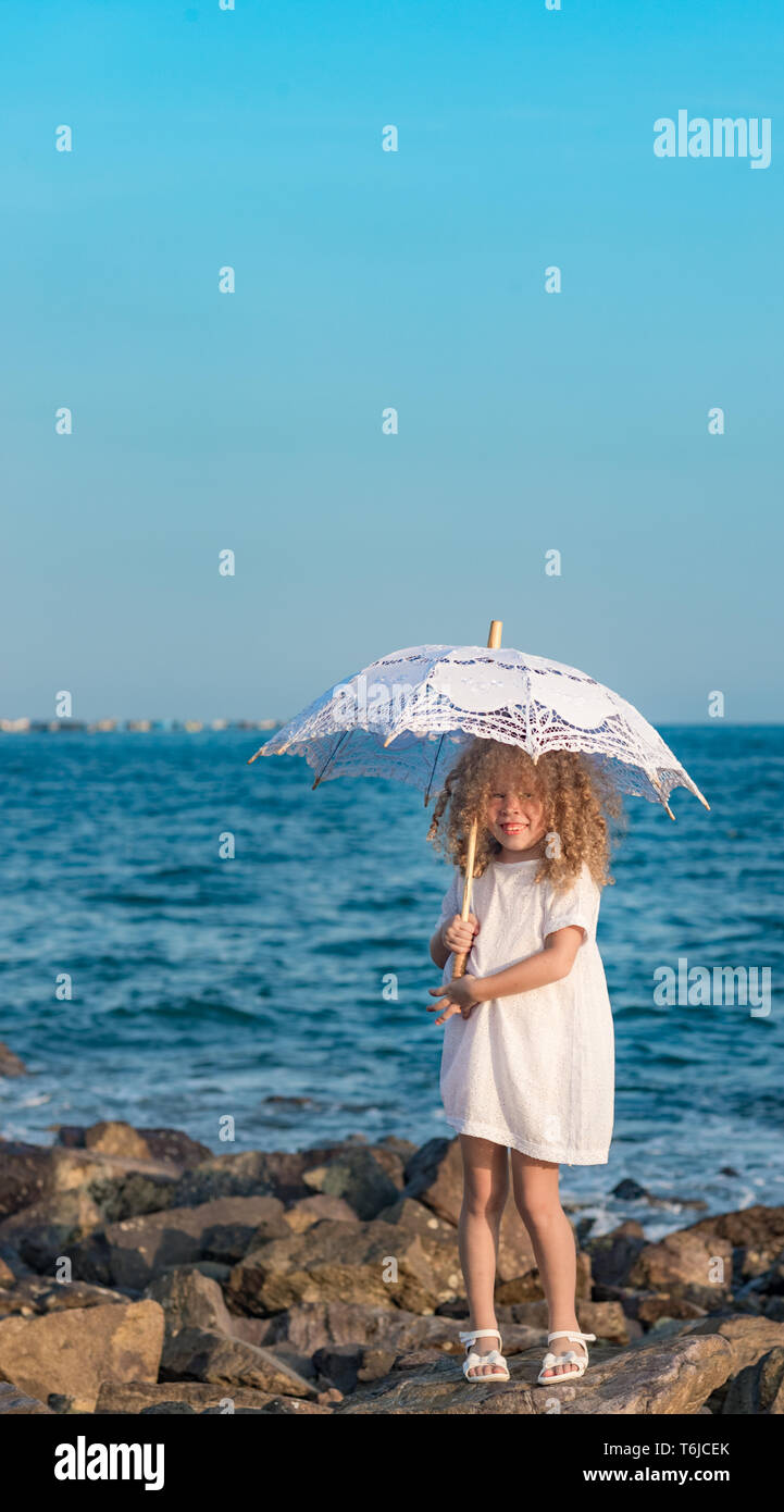 Child with umbrella little girl with umbrella hi-res stock photography ...