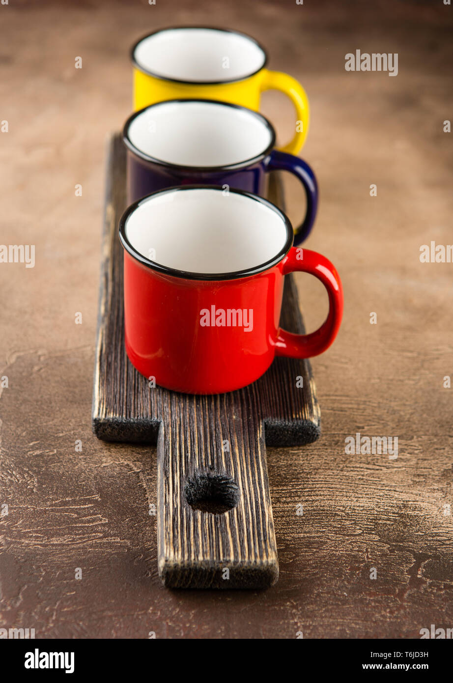 Colorful ceramic mugs Stock Photo - Alamy