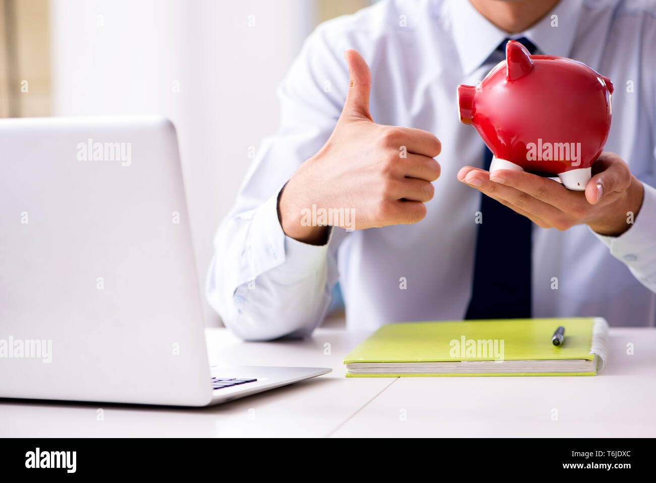 Sales agent working in travel agency Stock Photo - Alamy