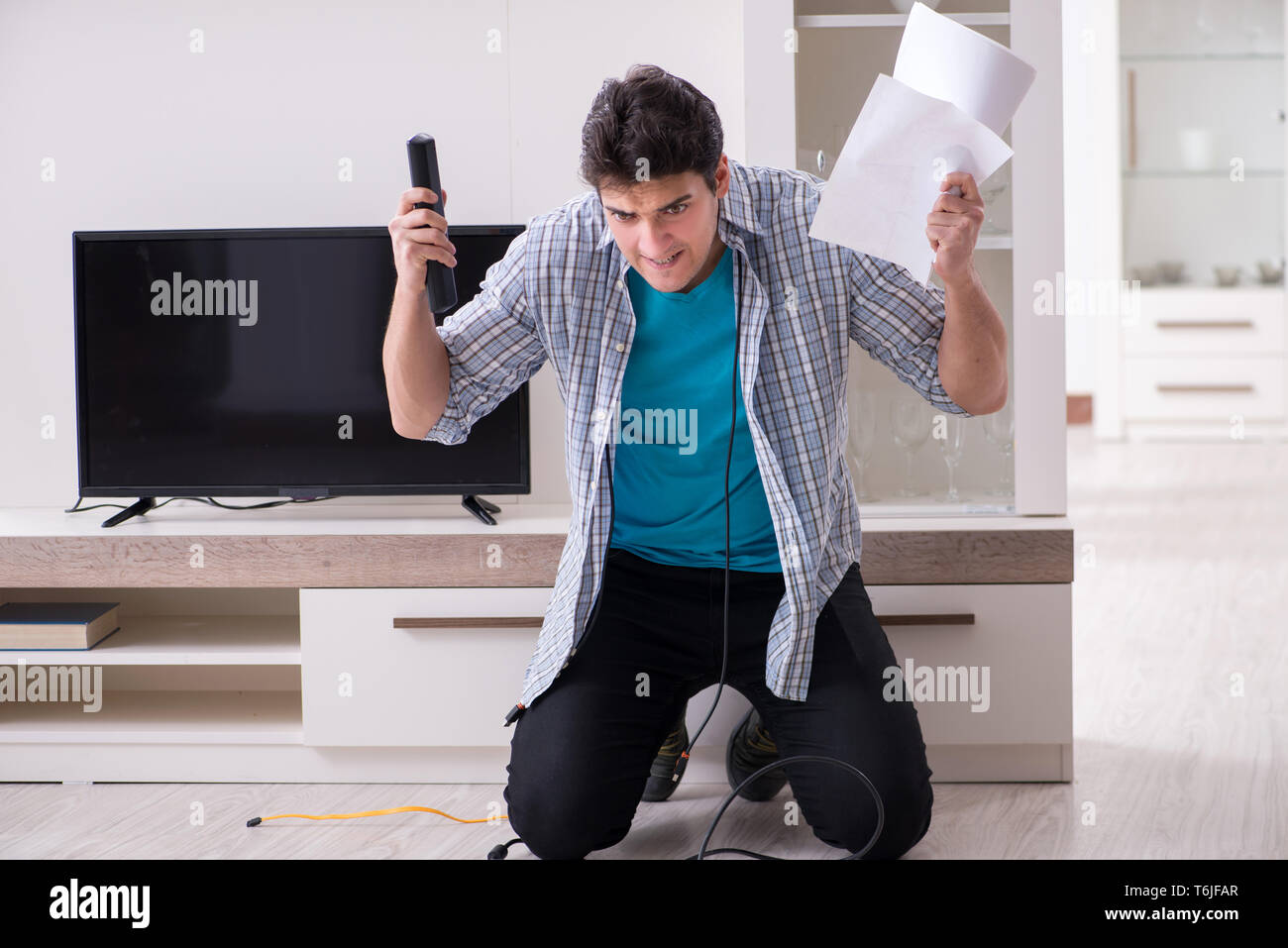 Fixing broken appliance manual hi-res stock photography and images - Alamy