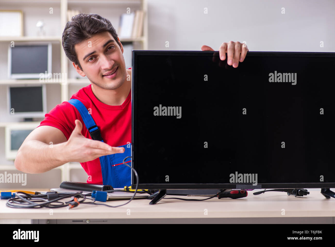 Electrician demonstrating his hi-res stock photography and images - Alamy