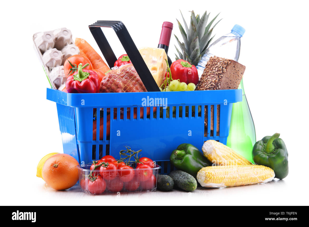 Plastic shopping basket with assorted grocery products isolated on ...