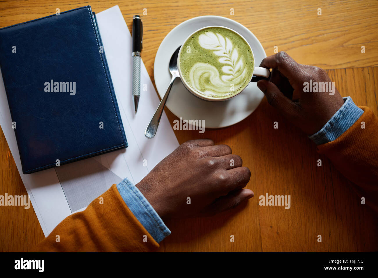 Man drinking latte hi-res stock photography and images - Alamy