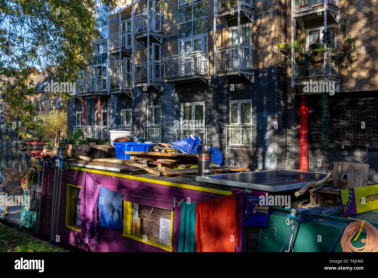 LONDON, UK – Oct 21, 2018: Rows of houseboats and narrow boats on the ...