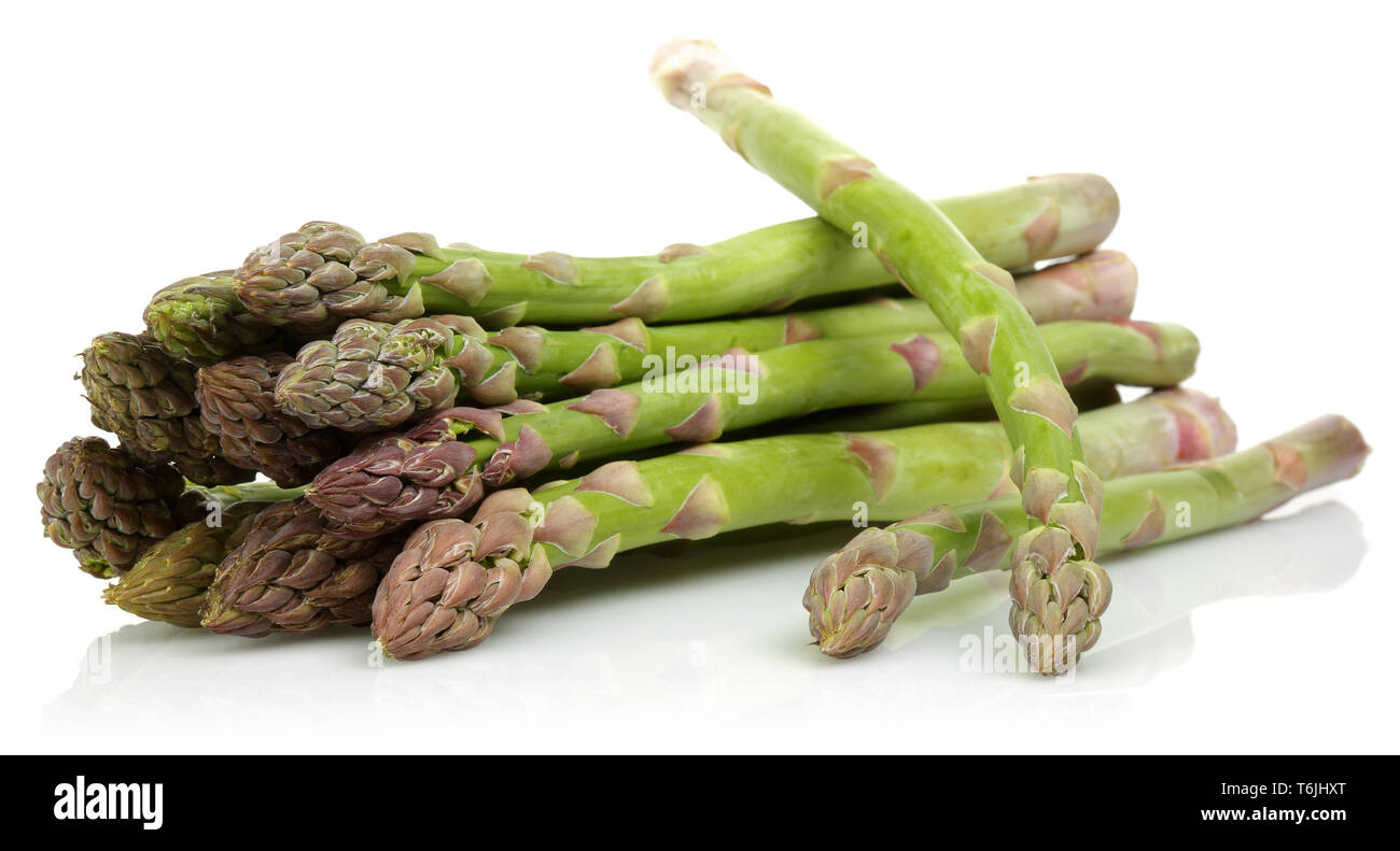 Green asparagus sticks isolated on white background Stock Photo - Alamy