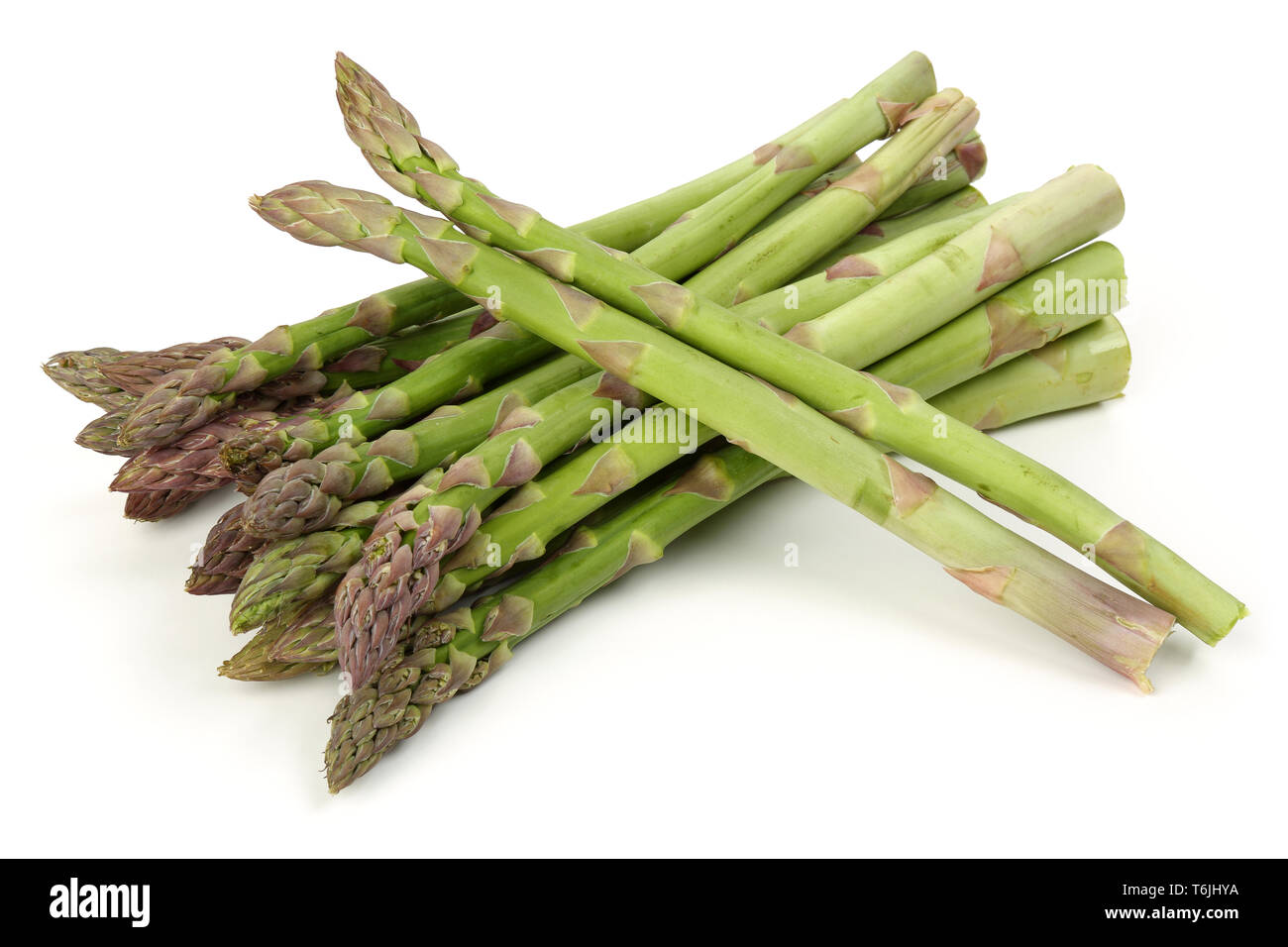 Green asparagus sticks isolated on white background Stock Photo - Alamy