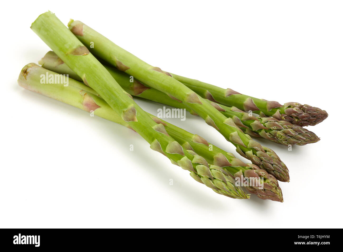 Green asparagus sticks isolated on white background Stock Photo - Alamy