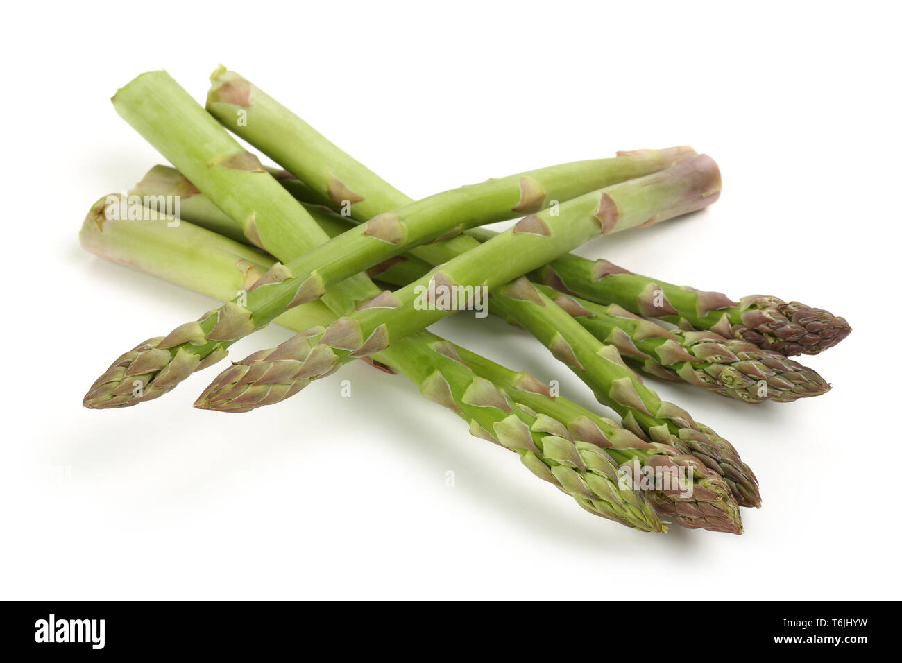 Green asparagus sticks isolated on white background Stock Photo - Alamy
