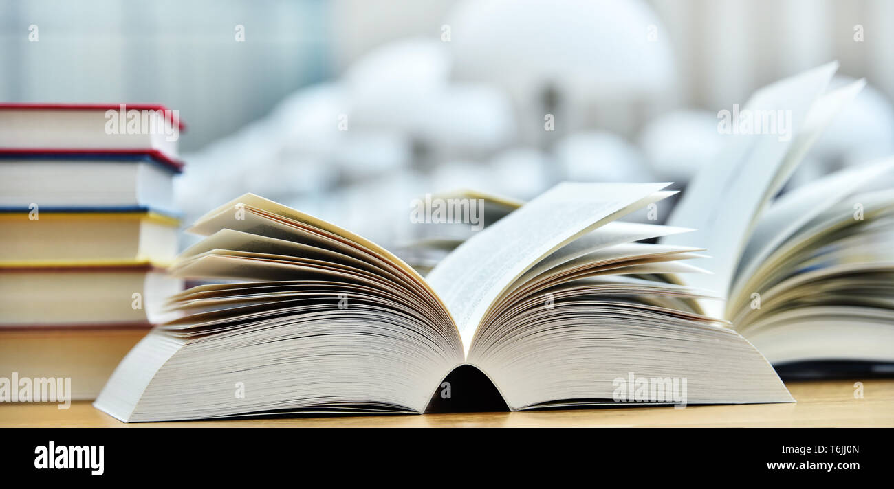 Books lying on the table hi-res stock photography and images - Alamy