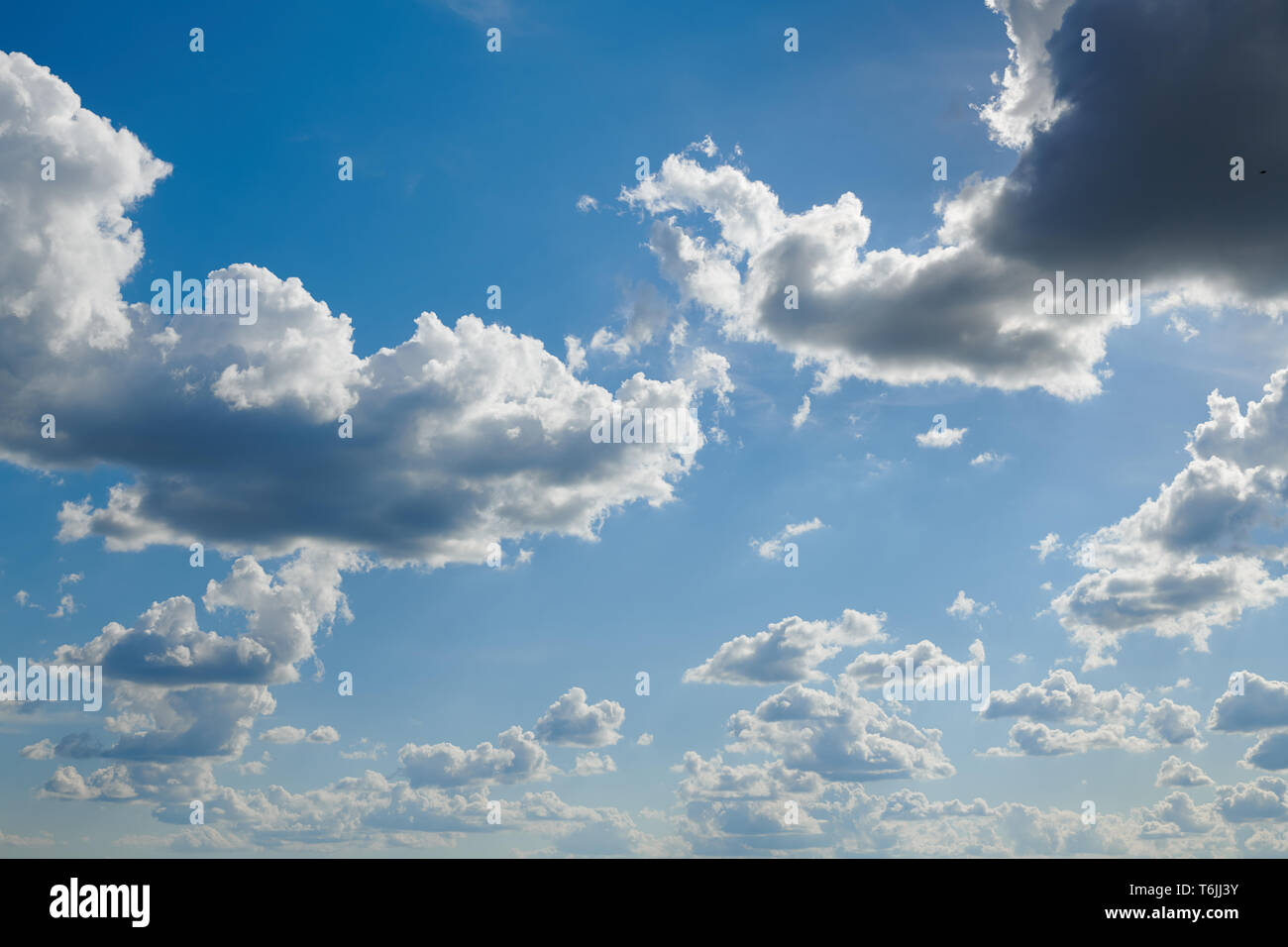 Bright sunny clouds, beautiful sky at day as background Stock Photo - Alamy
