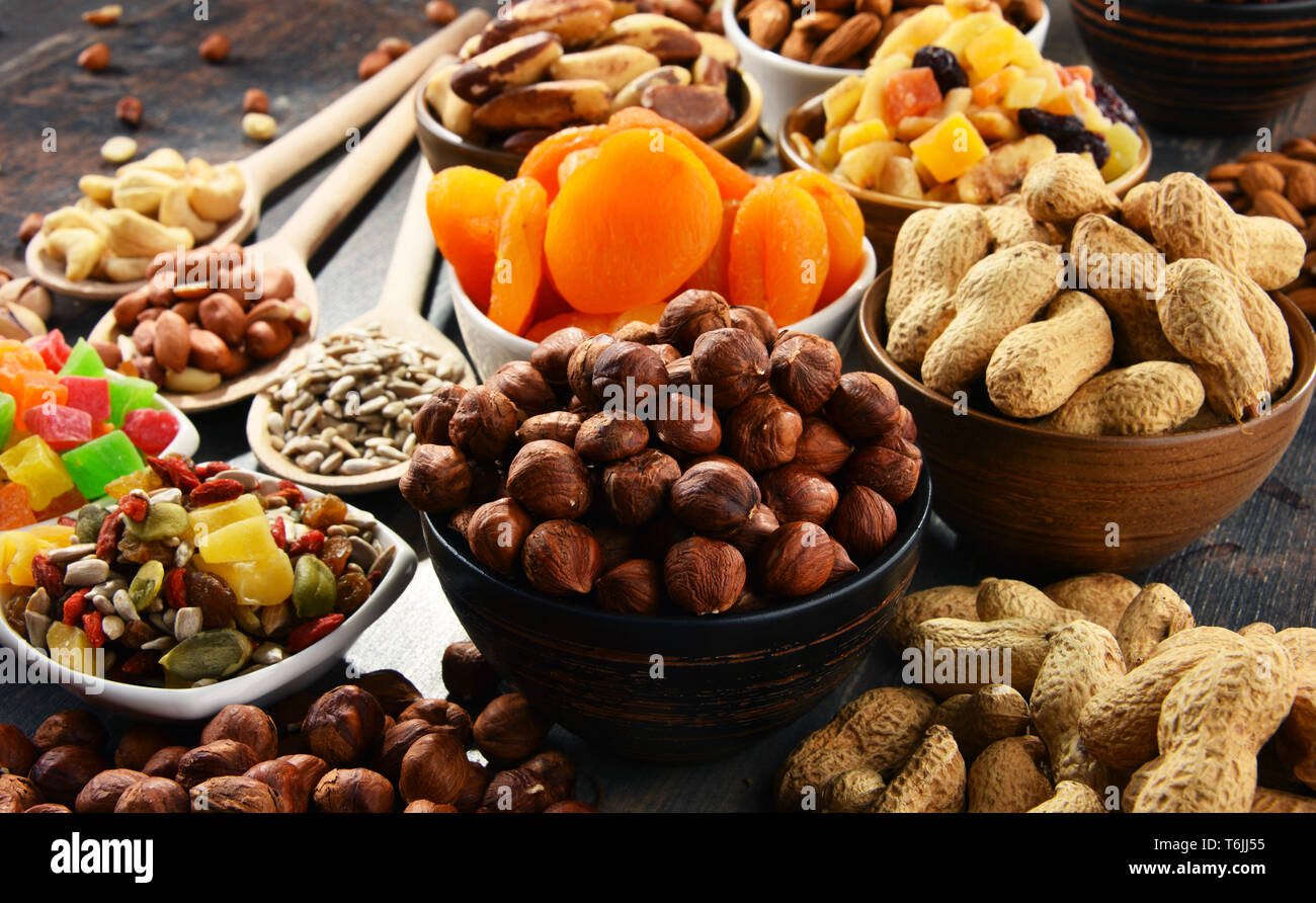 Composition with dried fruits and assorted nuts. Delicacies Stock Photo ...
