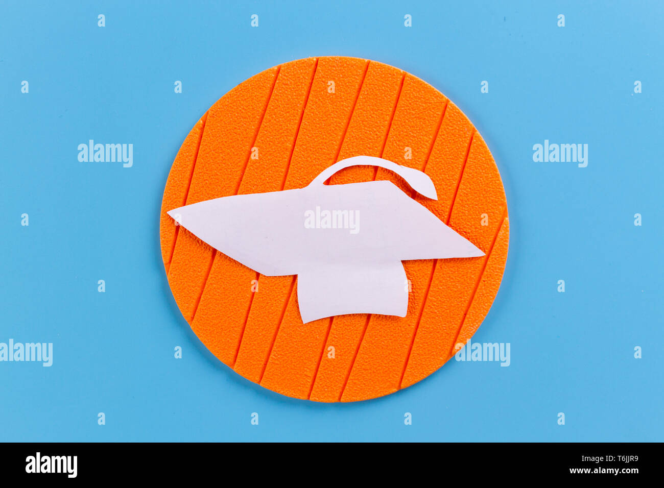 Graduation cap. paper art on the blue background Stock Photo - Alamy