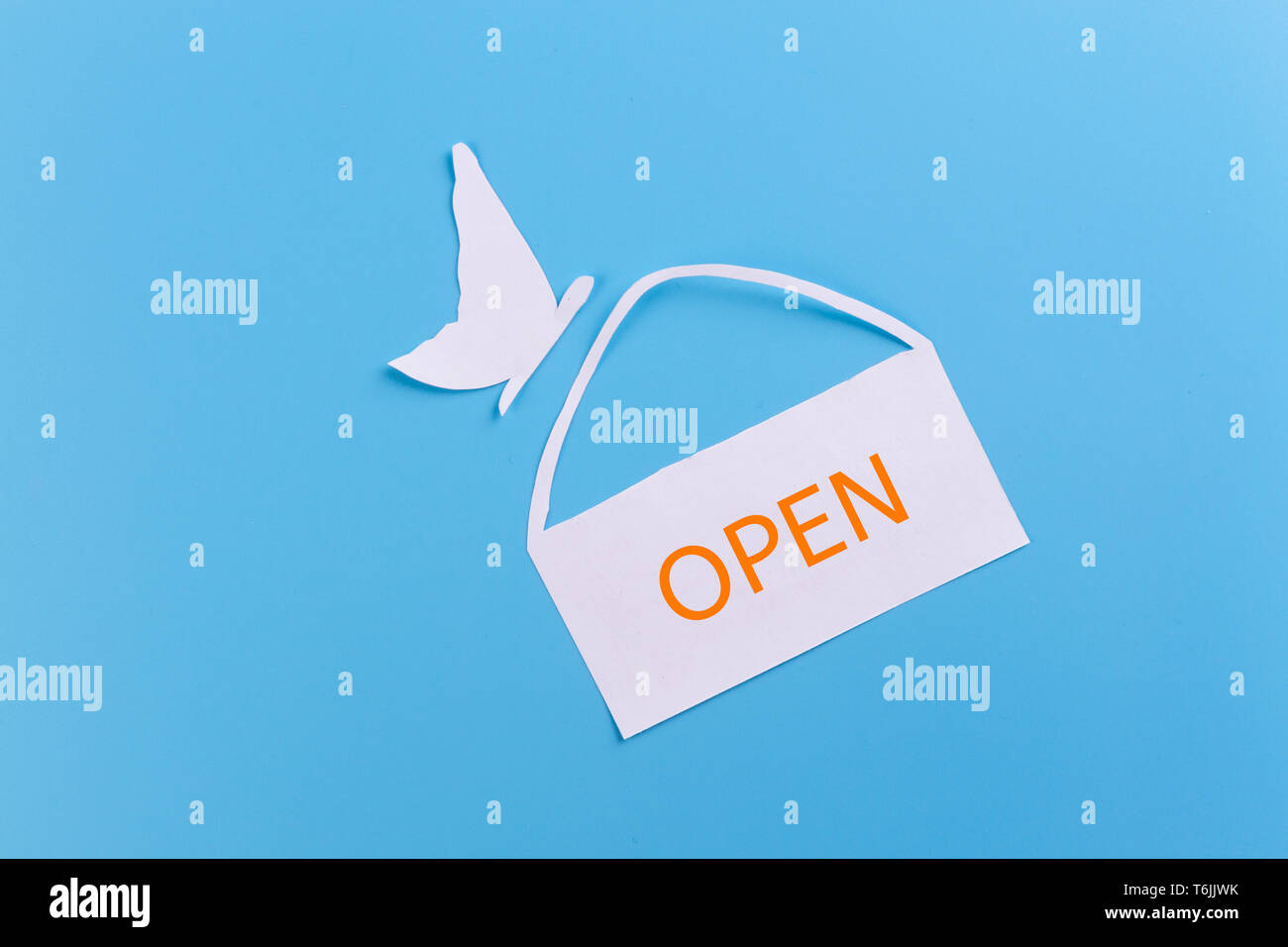 open sign broad. paper cut blue background Stock Photo - Alamy