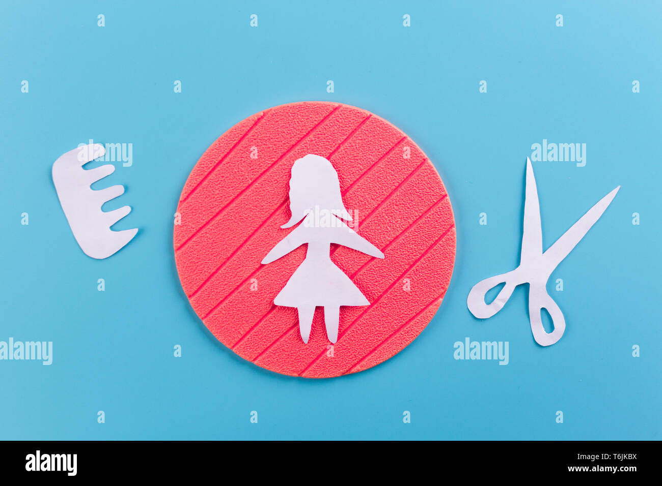 Scissors cut the girls hair. paper concept Stock Photo - Alamy