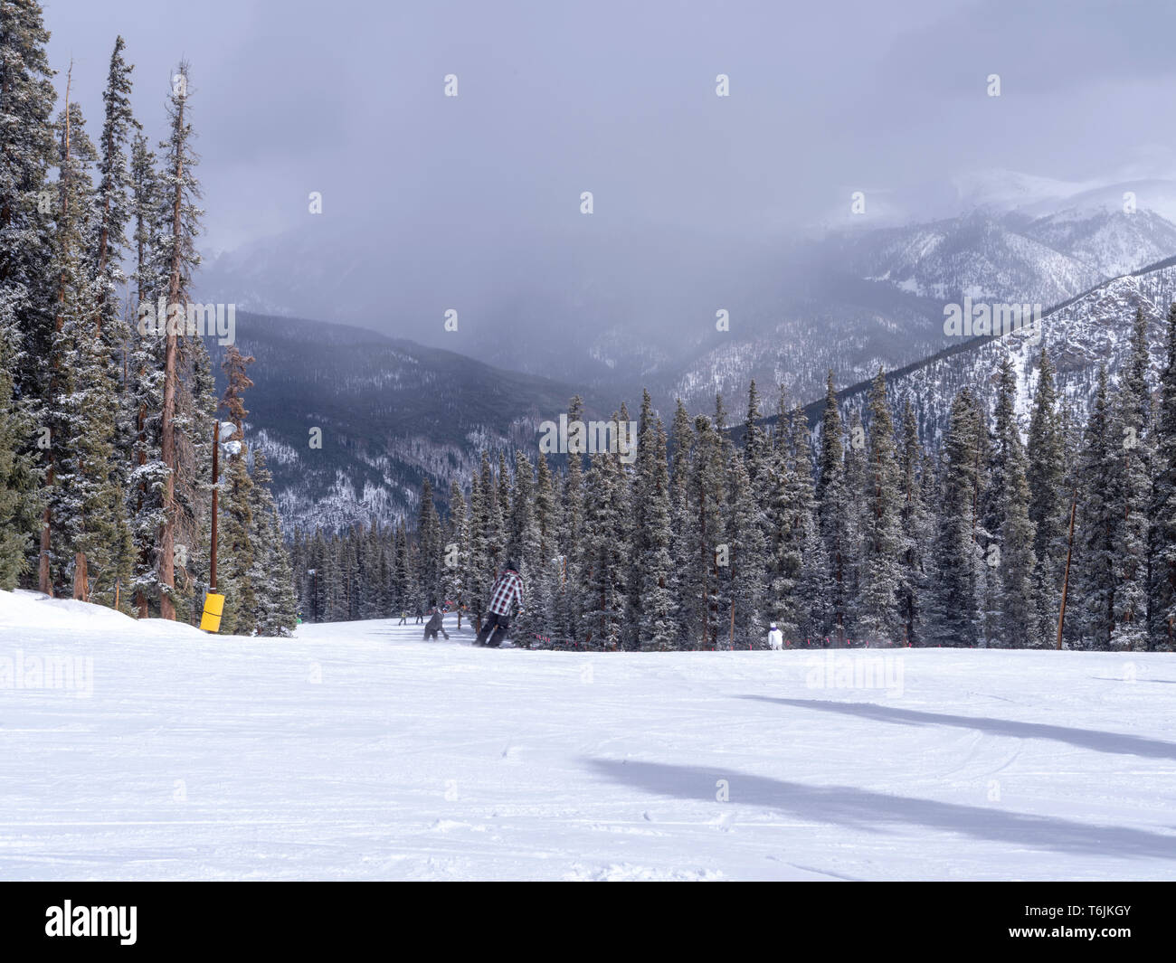 People skiing and preparing to ski at Keystone Ski Resort, Keystone ...