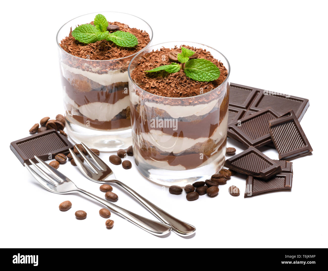 two portions Classic tiramisu dessert in a glass and chocolate bar ...