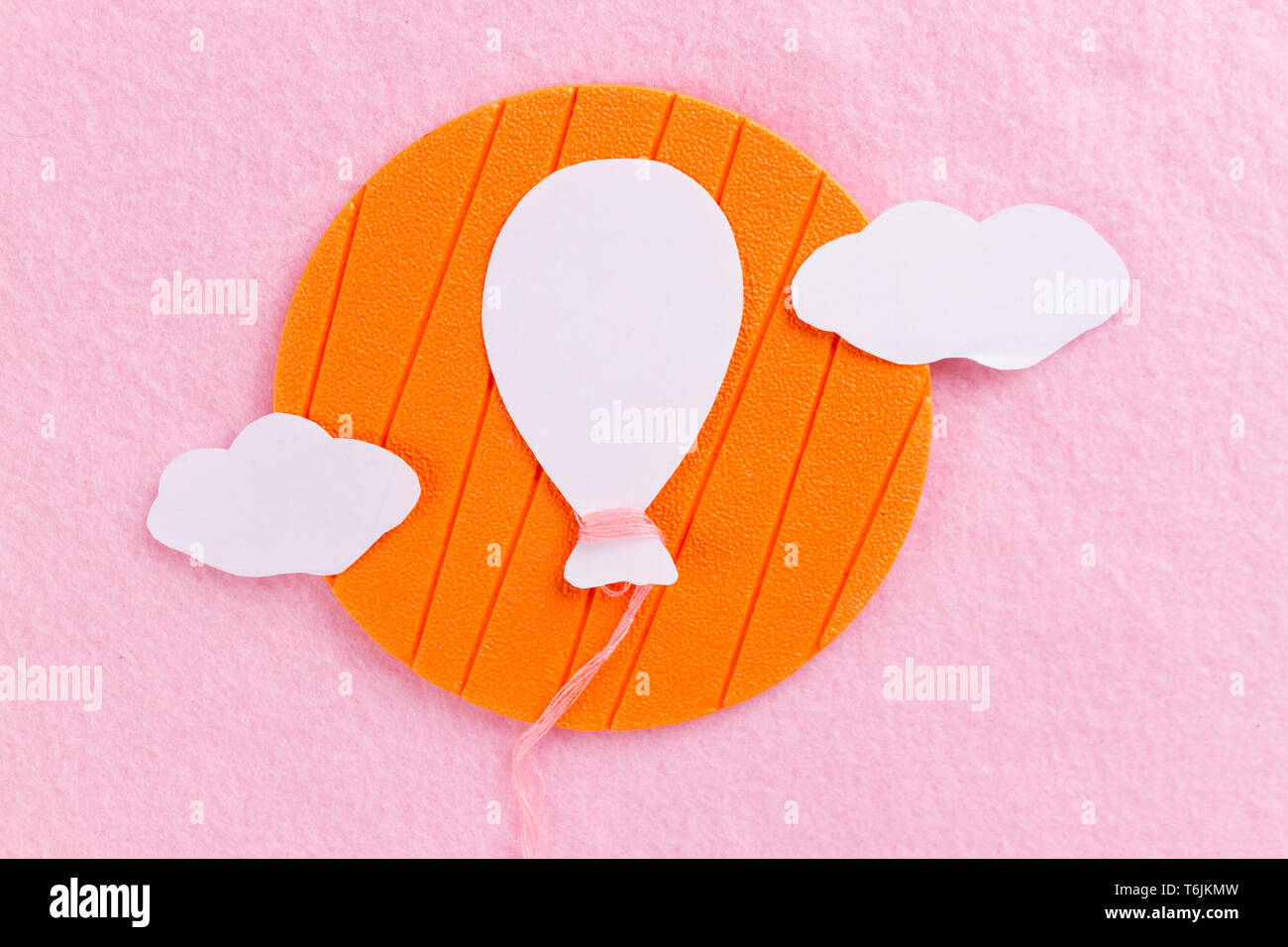 paper art of air balloon on blue background Stock Photo - Alamy