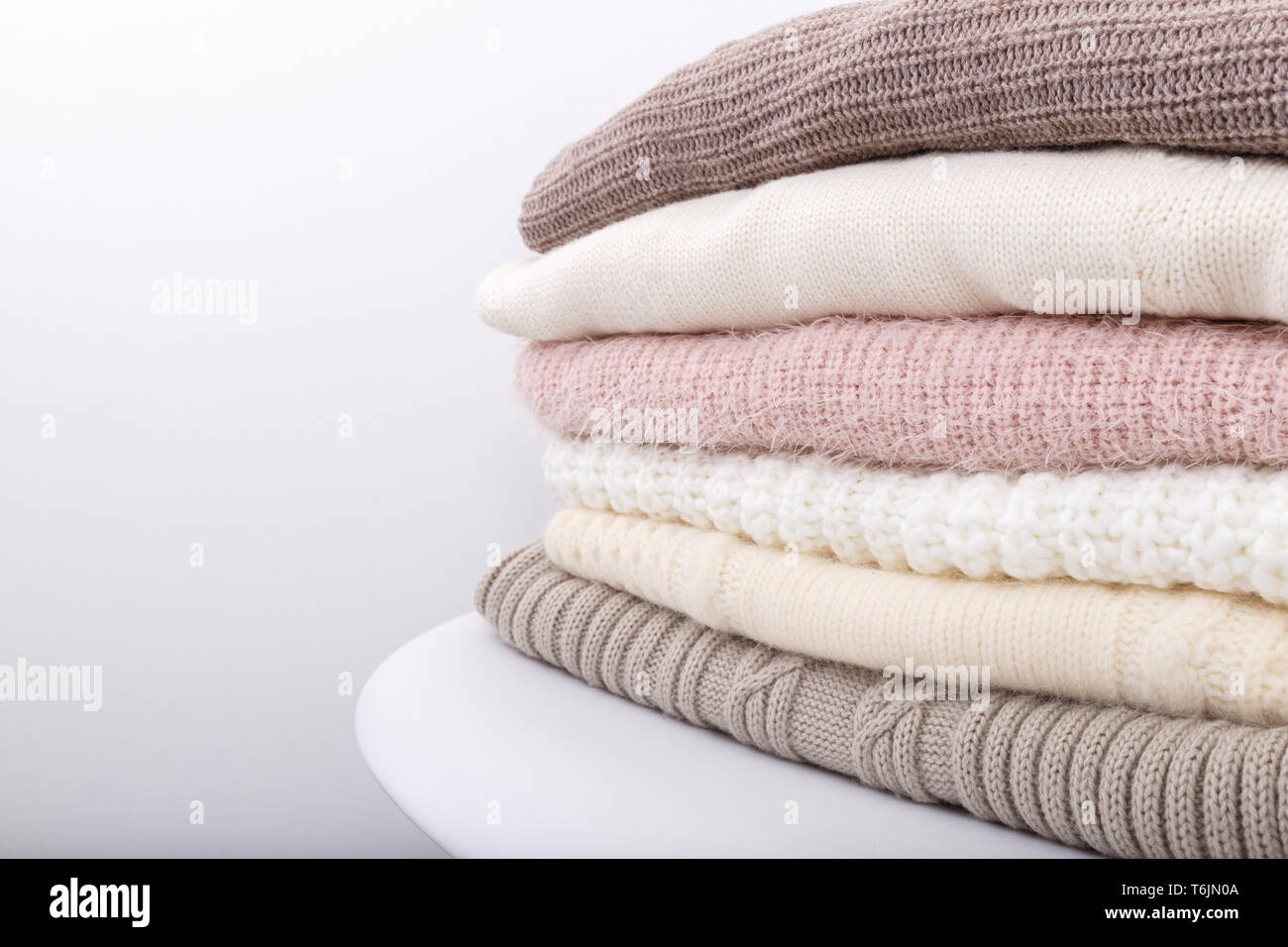 Stack of cozy knitted sweaters Stock Photo - Alamy