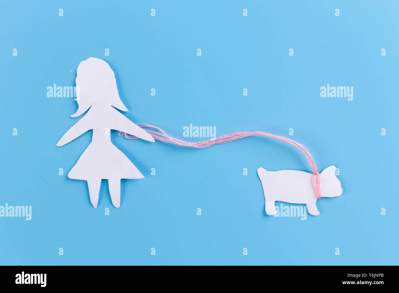 dog with a host. made of paper Stock Photo - Alamy