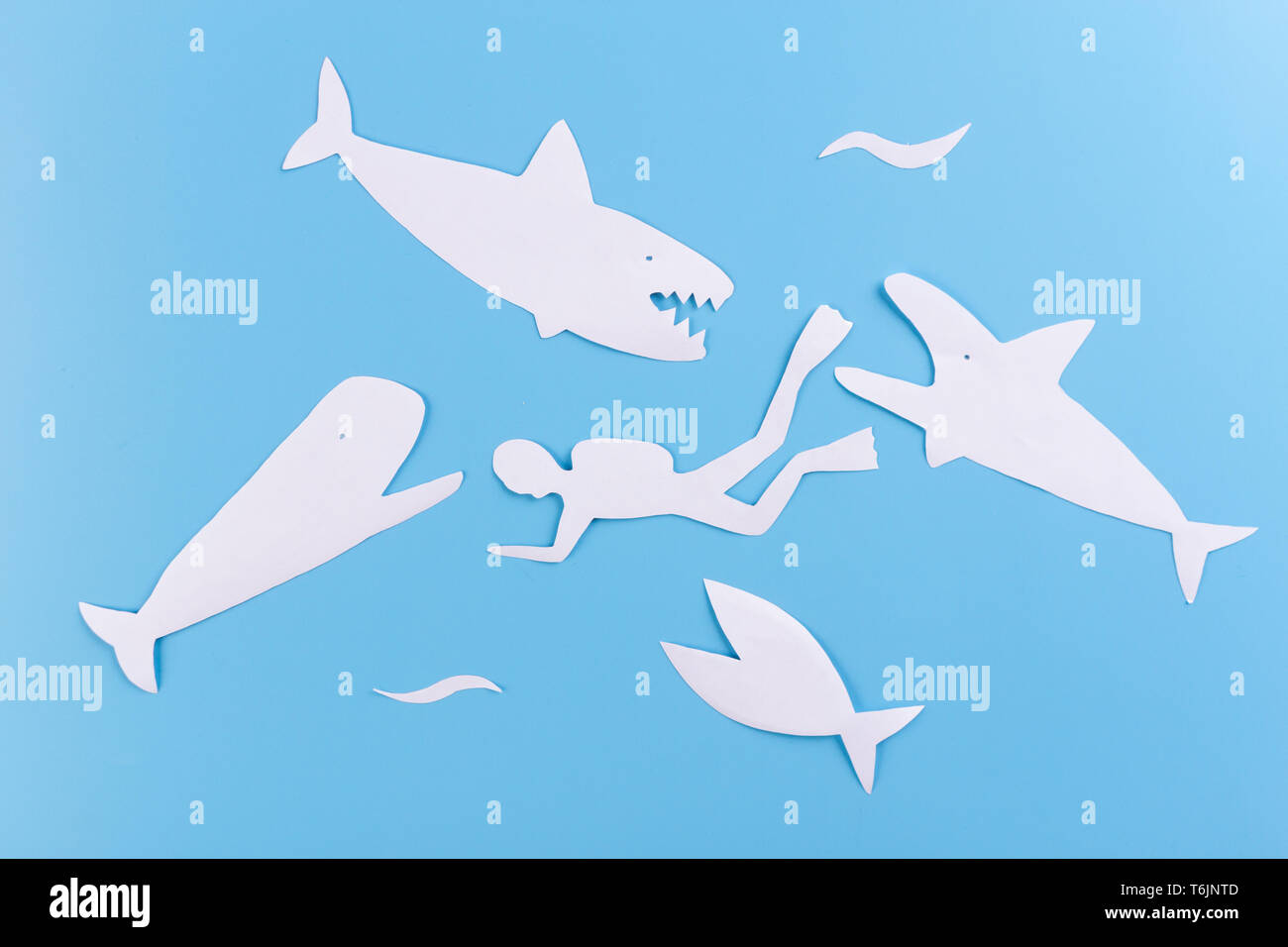 Shark attack. Life insurance concept. paper cut Stock Photo - Alamy