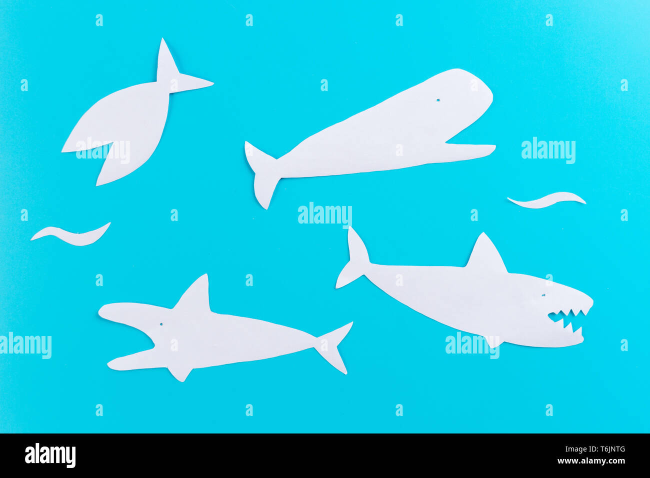 Shark attack. Life insurance concept. paper cut Stock Photo - Alamy