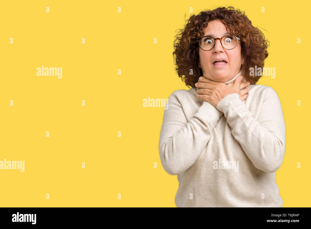 Beautiful middle ager senior woman wearing turtleneck sweater and ...