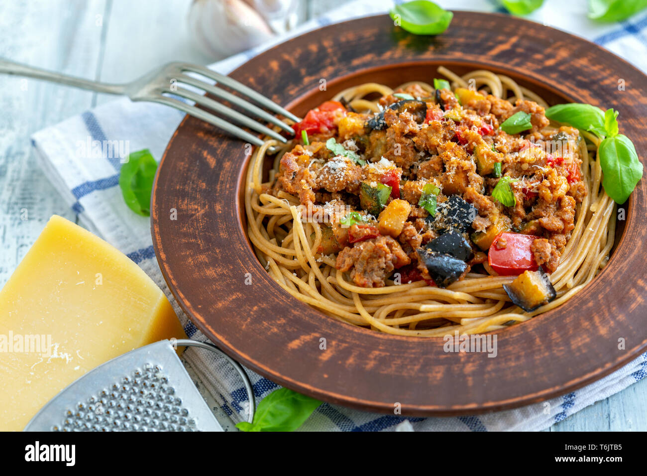 Spaghetti with bolognese sauce, vegetables and basil Stock Photo - Alamy