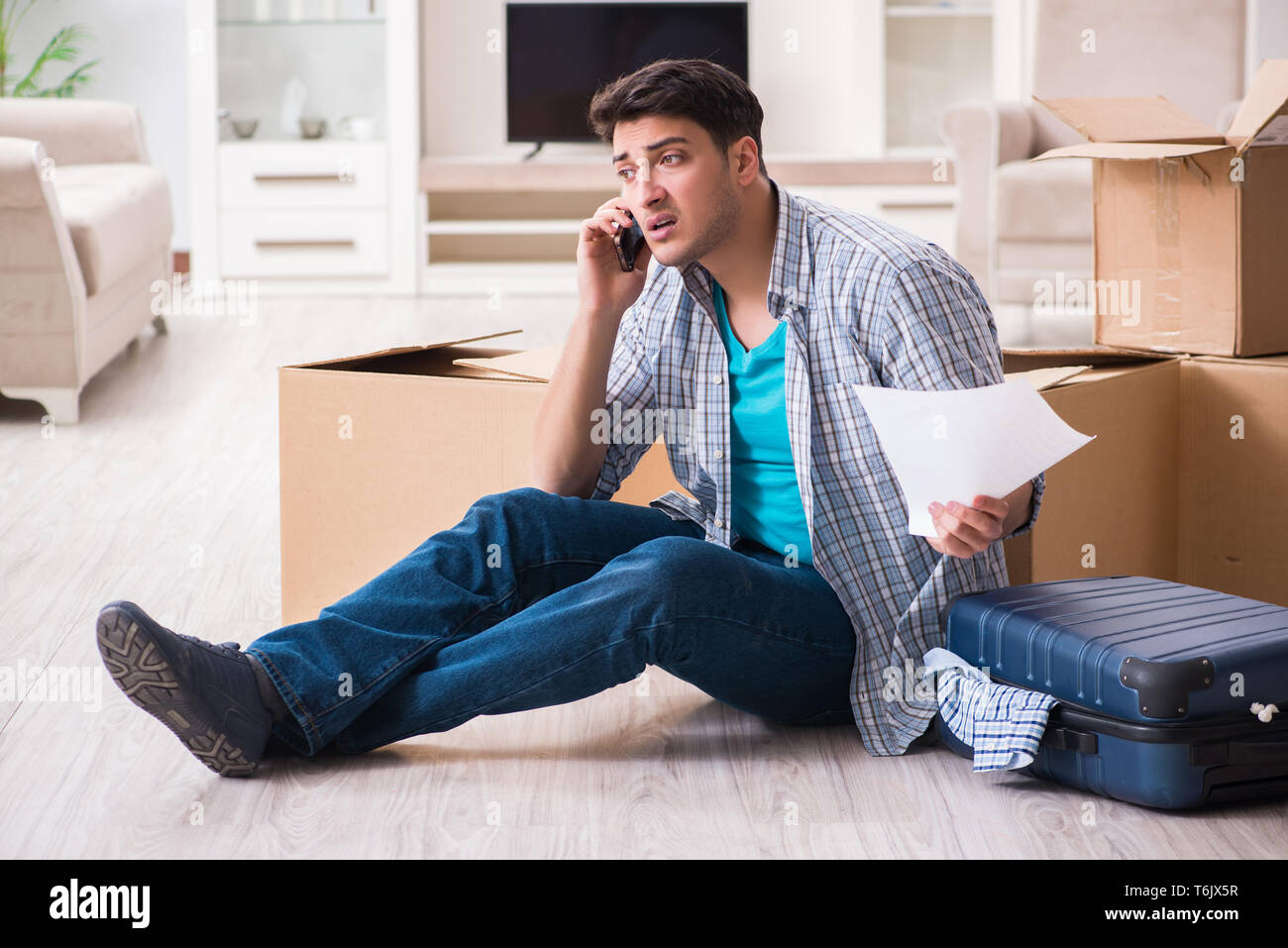 The unemployed man receiving foreclosure notice letter Stock Photo - Alamy