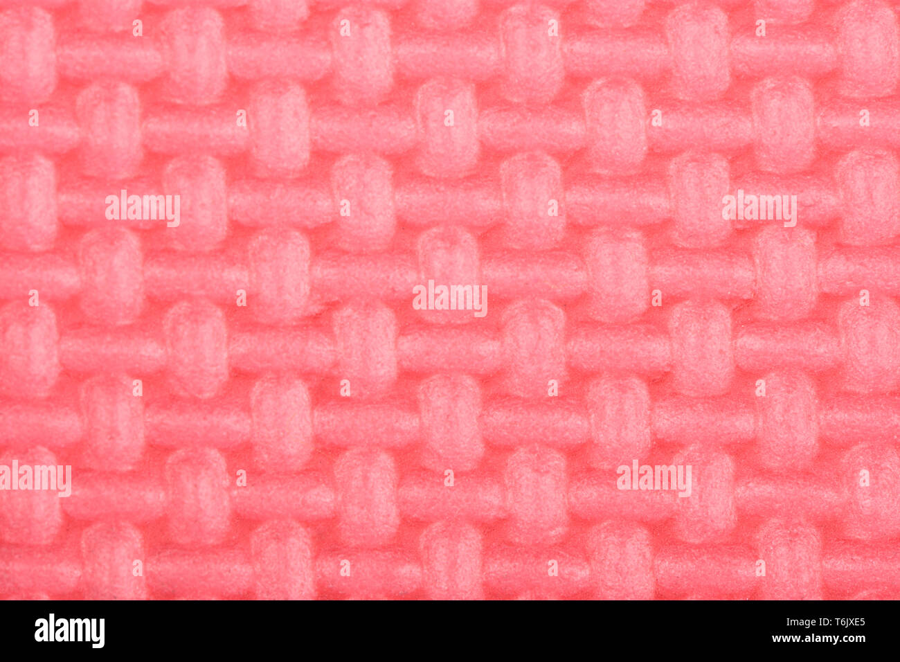 Texture of a polyethylene red shine gym mat. Yoga mat texture. Red ...
