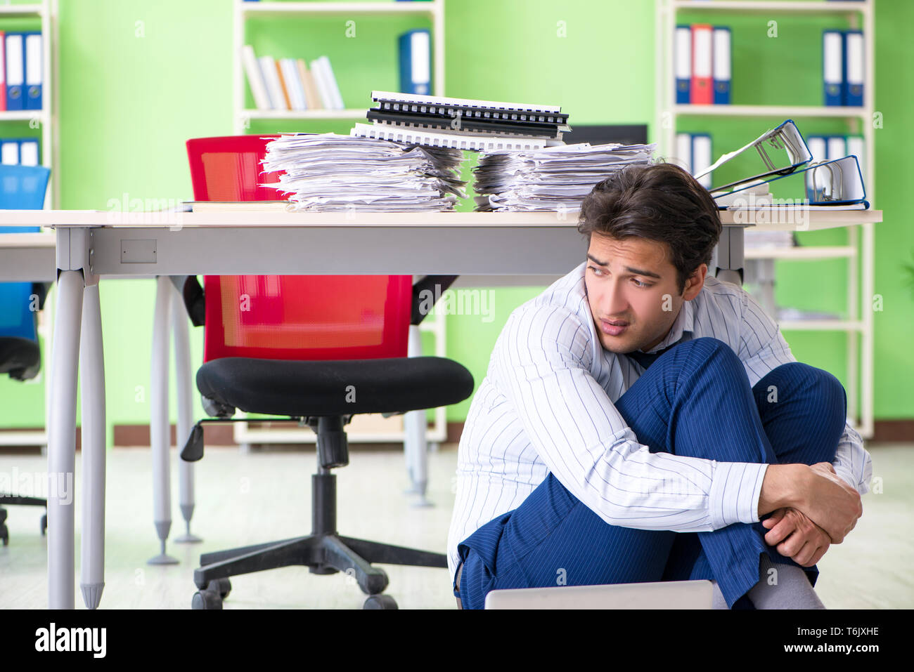 The frustrated businessman stressed from excessive work Stock Photo - Alamy